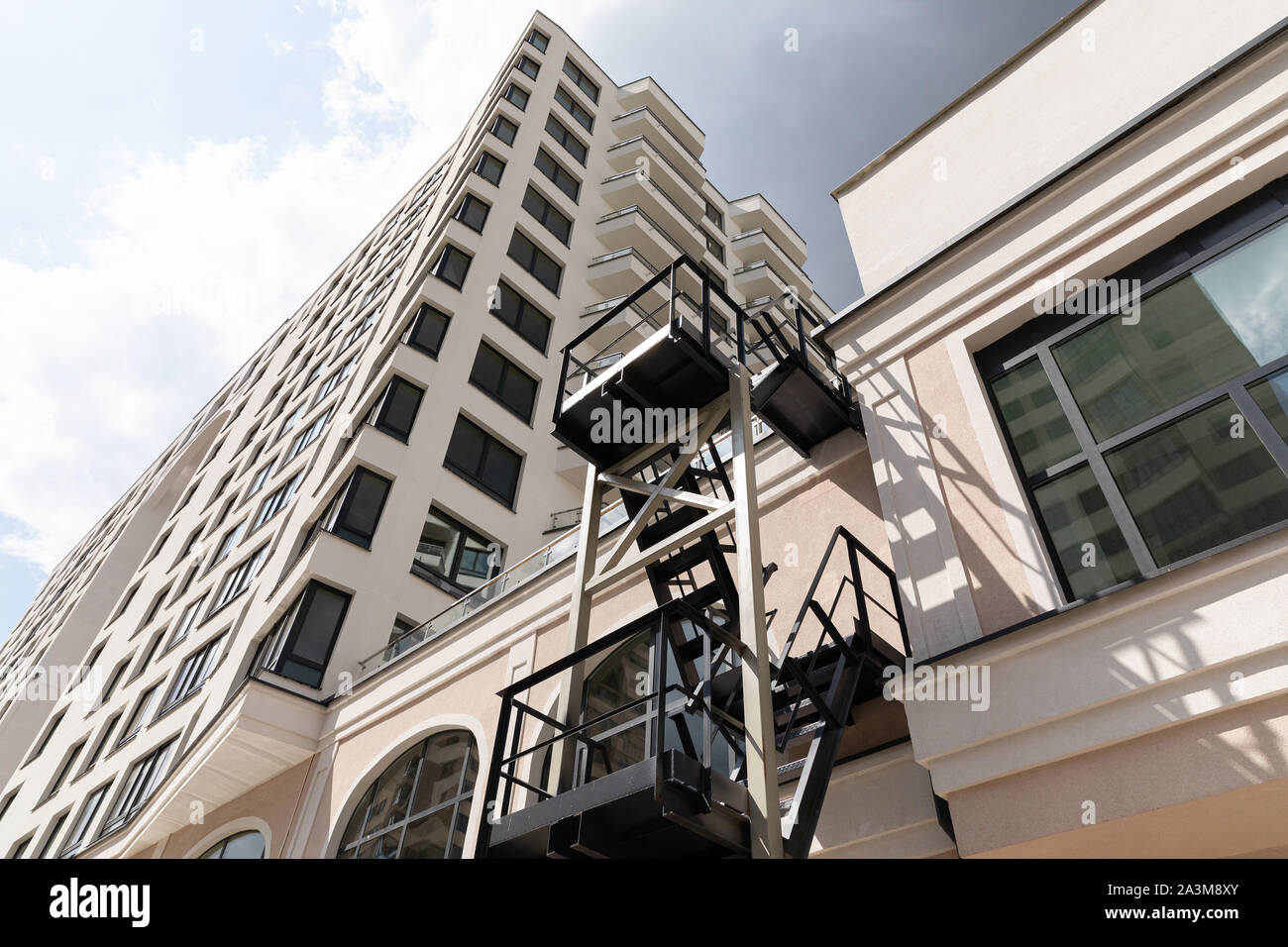 Modern high apartment building of increased comfort bottom view. The ...