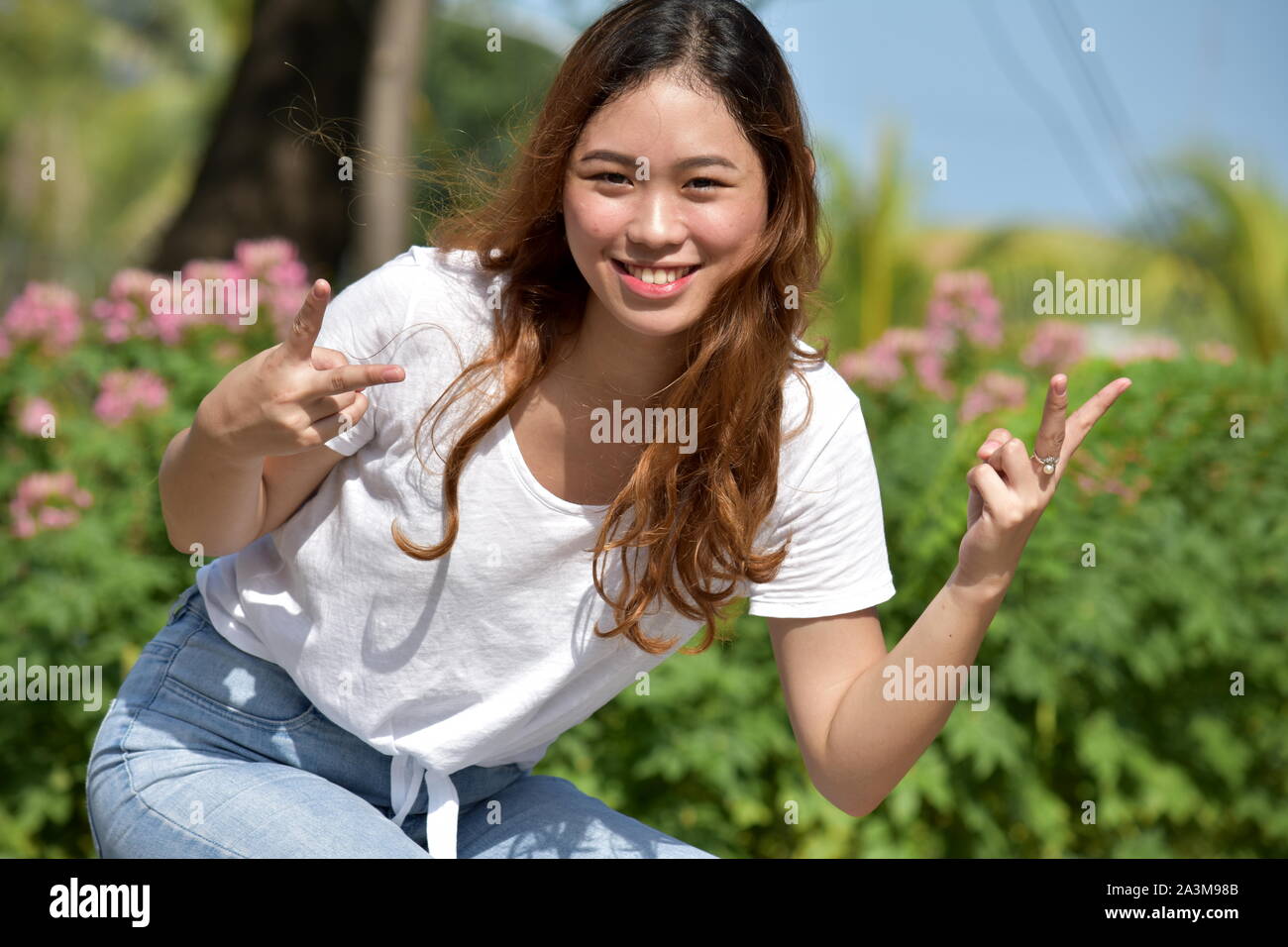 Female And Victory Stock Photo - Alamy