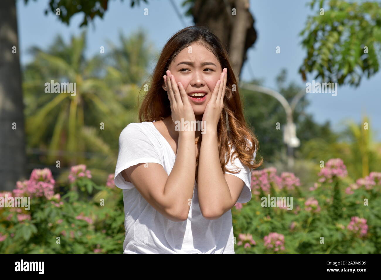 Stunned beautiful young woman hi-res stock photography and images - Alamy