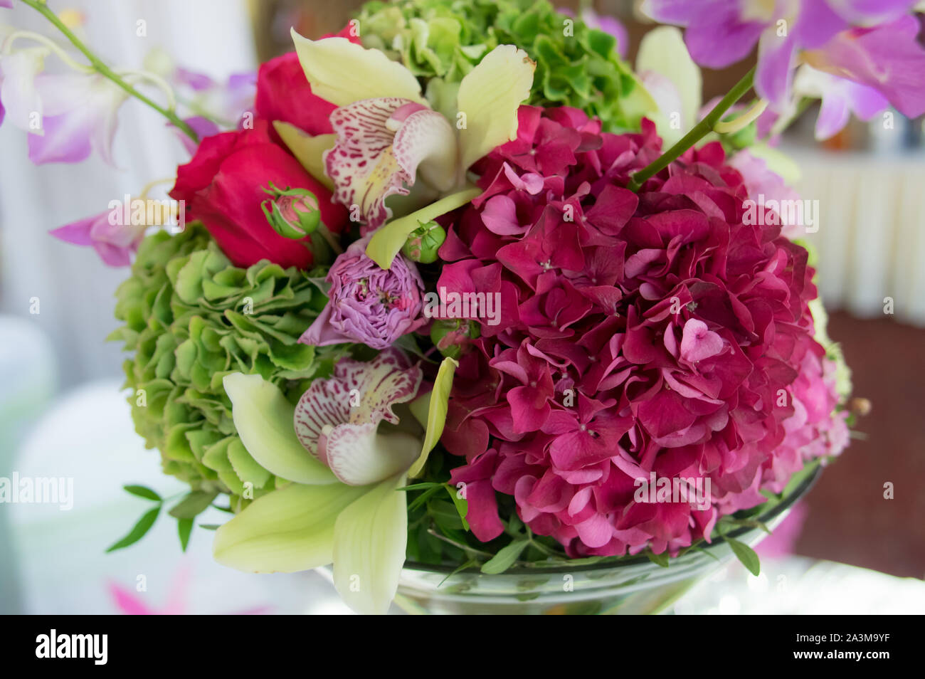 Colorful bouquet with hydrangea, roses and orchid, wedding decoration ...