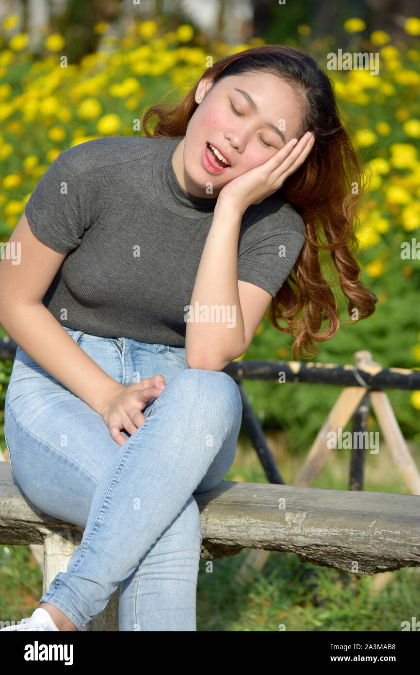 Tired Pretty Filipina Female Stock Photo - Alamy