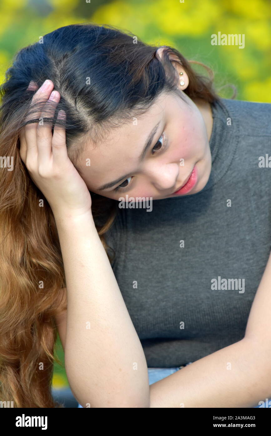 Beautiful Filipina Female And Worry Stock Photo - Alamy