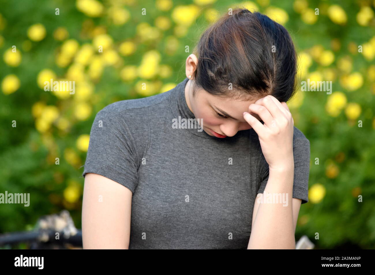 Sad Youthful Asian Female Stock Photo - Alamy