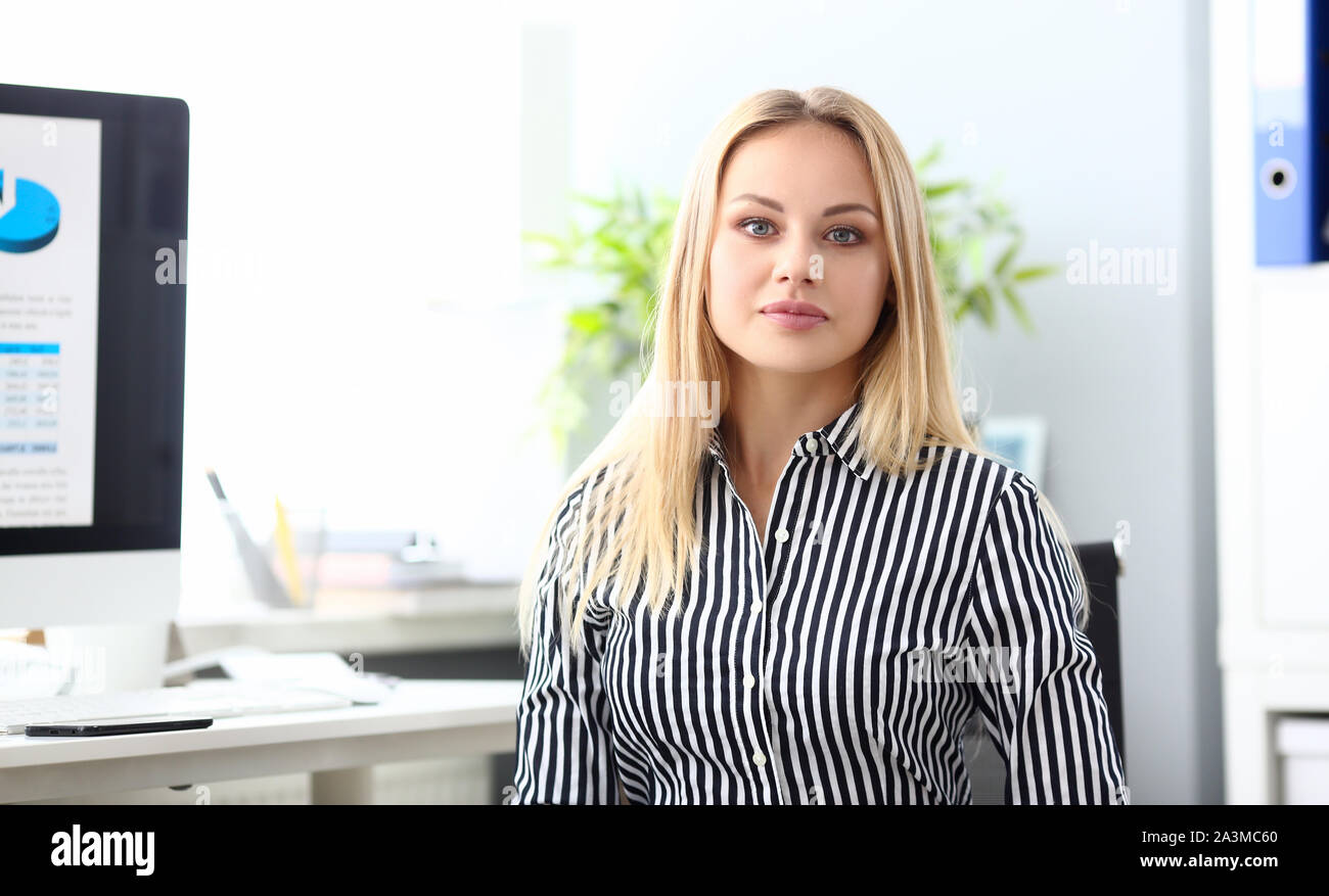Cute woman at workplace Stock Photo - Alamy