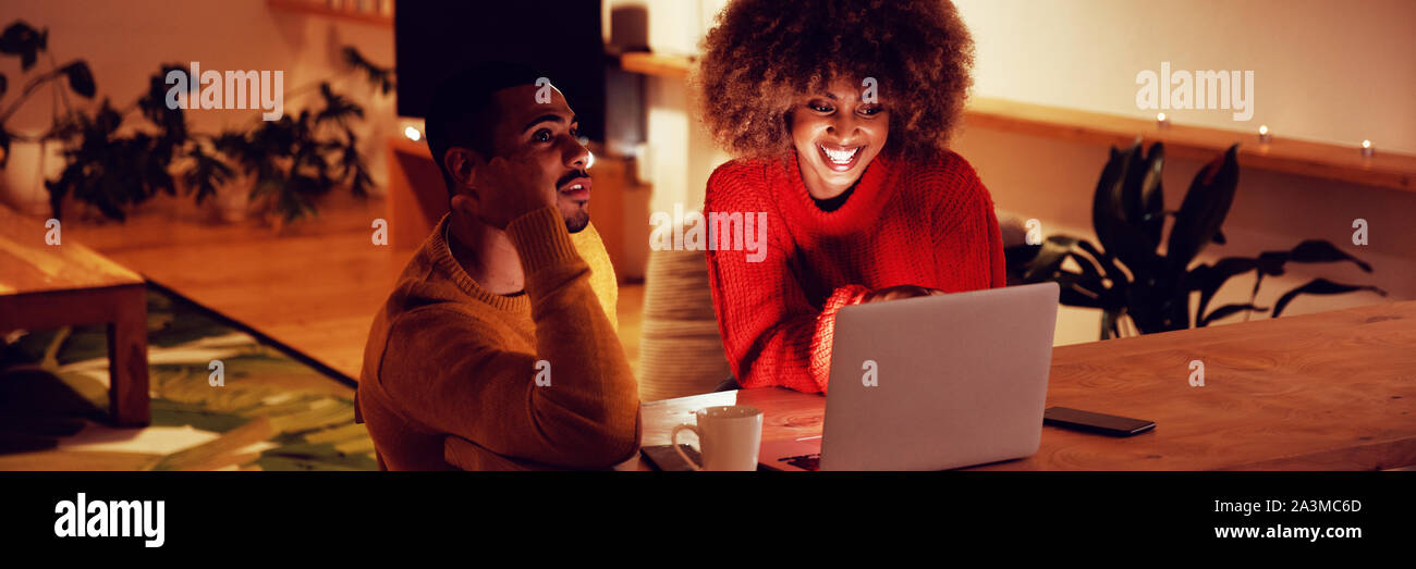 Millennial adult friends socialising together at home Stock Photo - Alamy
