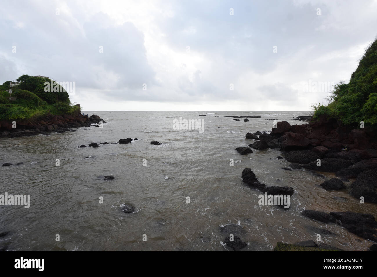 Rocks by the sea at Dona Paula. Panaji, Goa, India Stock Photo - Alamy