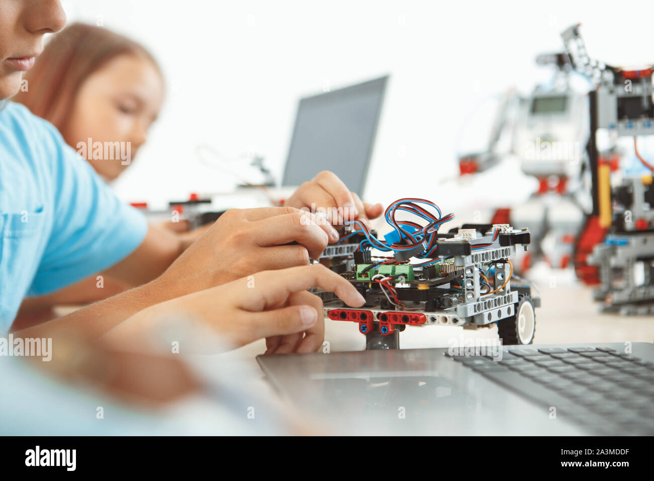 Robotics. Children having class fixing robot close-up blurred Stock ...