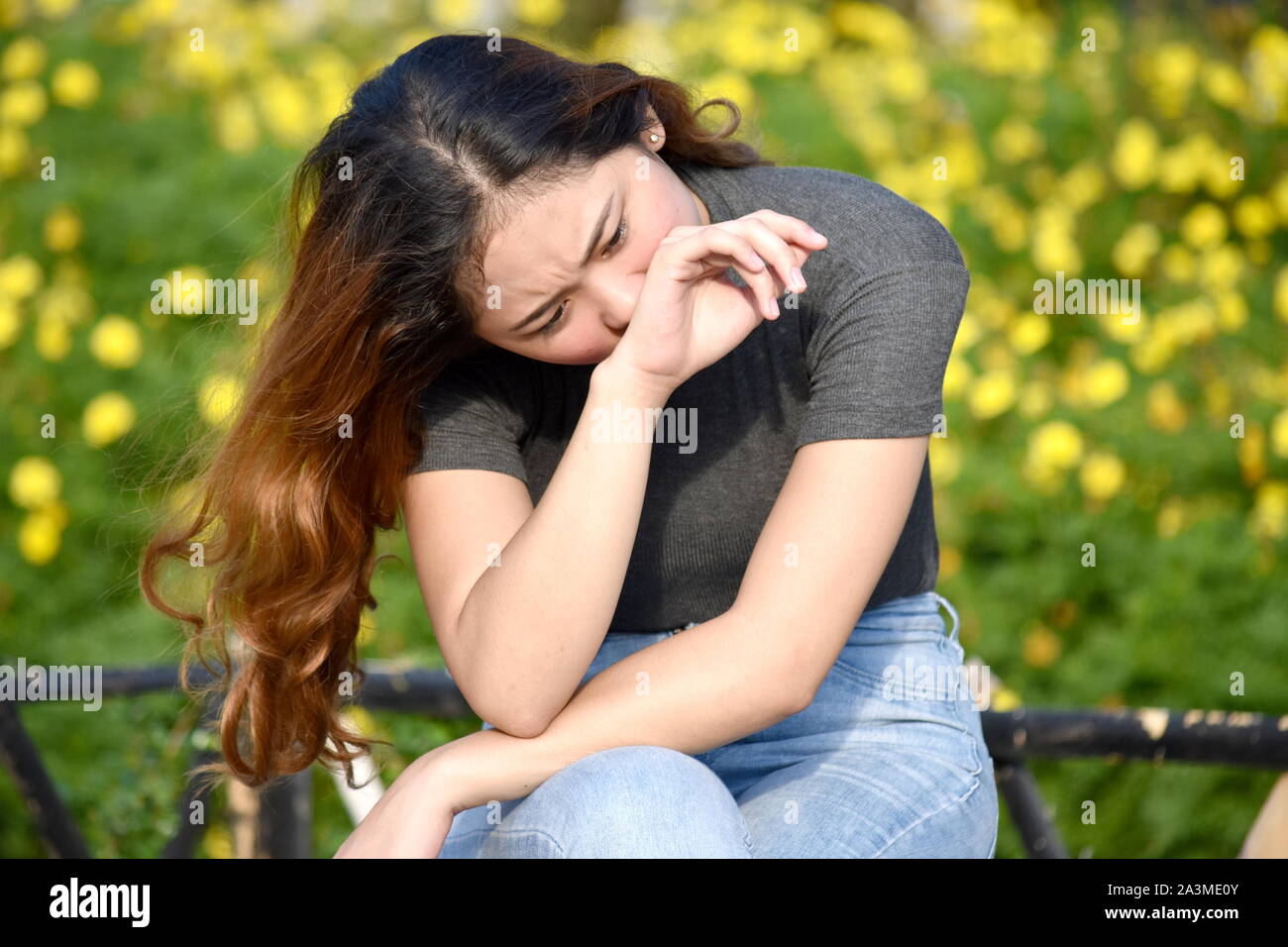 Tearful Young Asian Person Stock Photo - Alamy