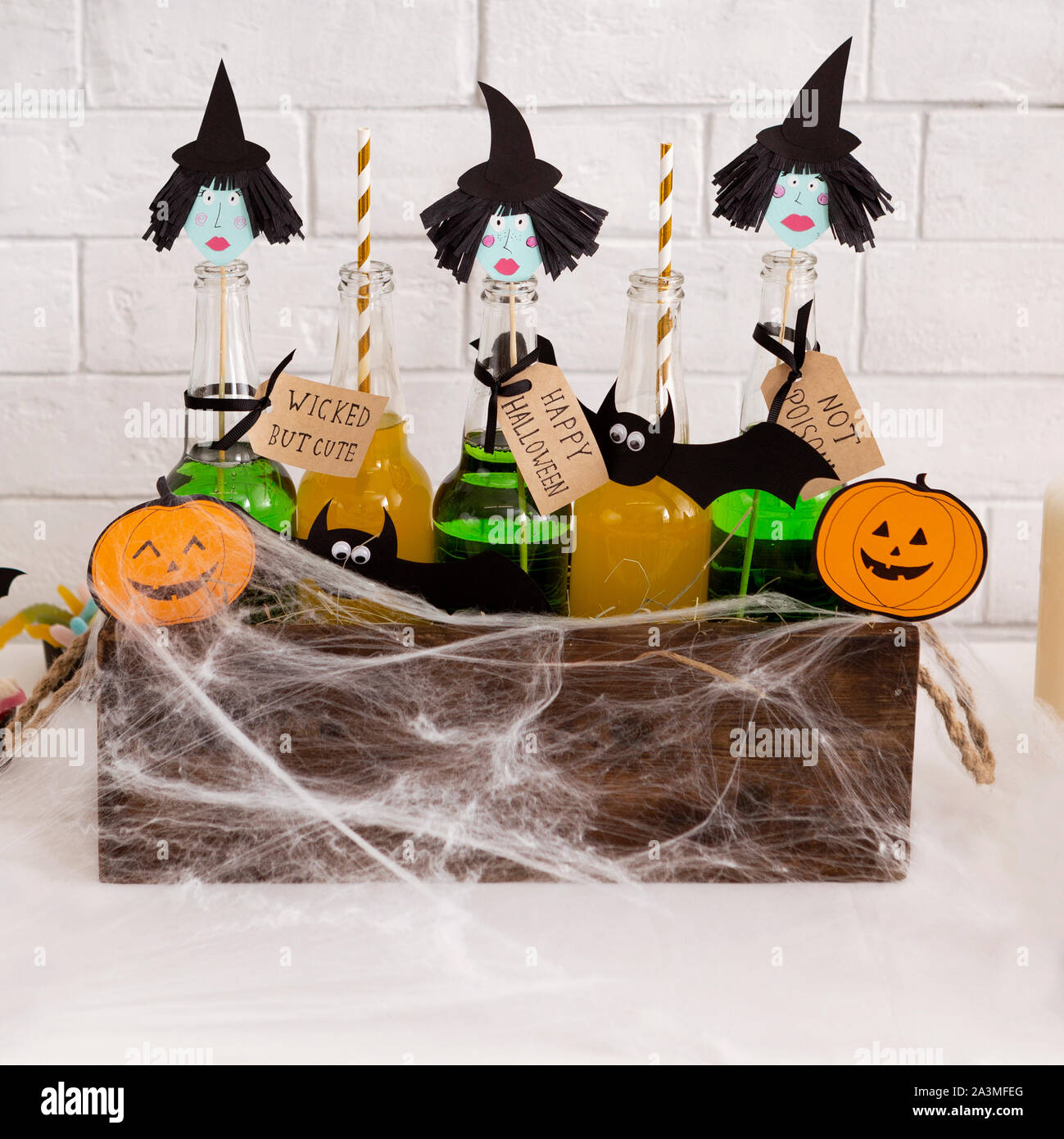 Kind and cute witches with liquid inside standing in wooden box Stock ...