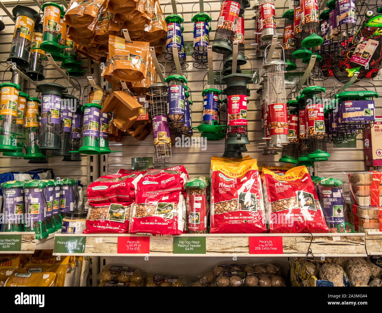 Multi shopping experience with food and accessories for birds at a ...