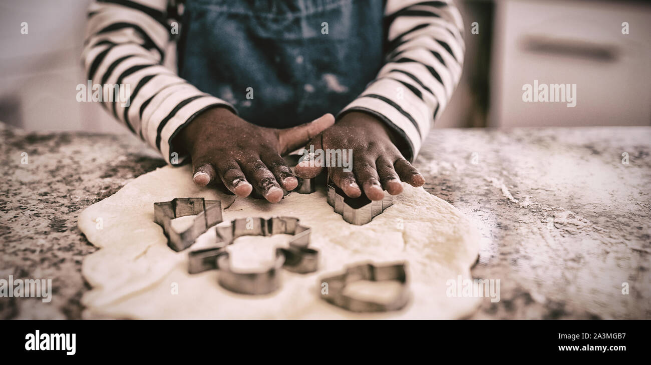 Boy making cookies hi-res stock photography and images - Alamy