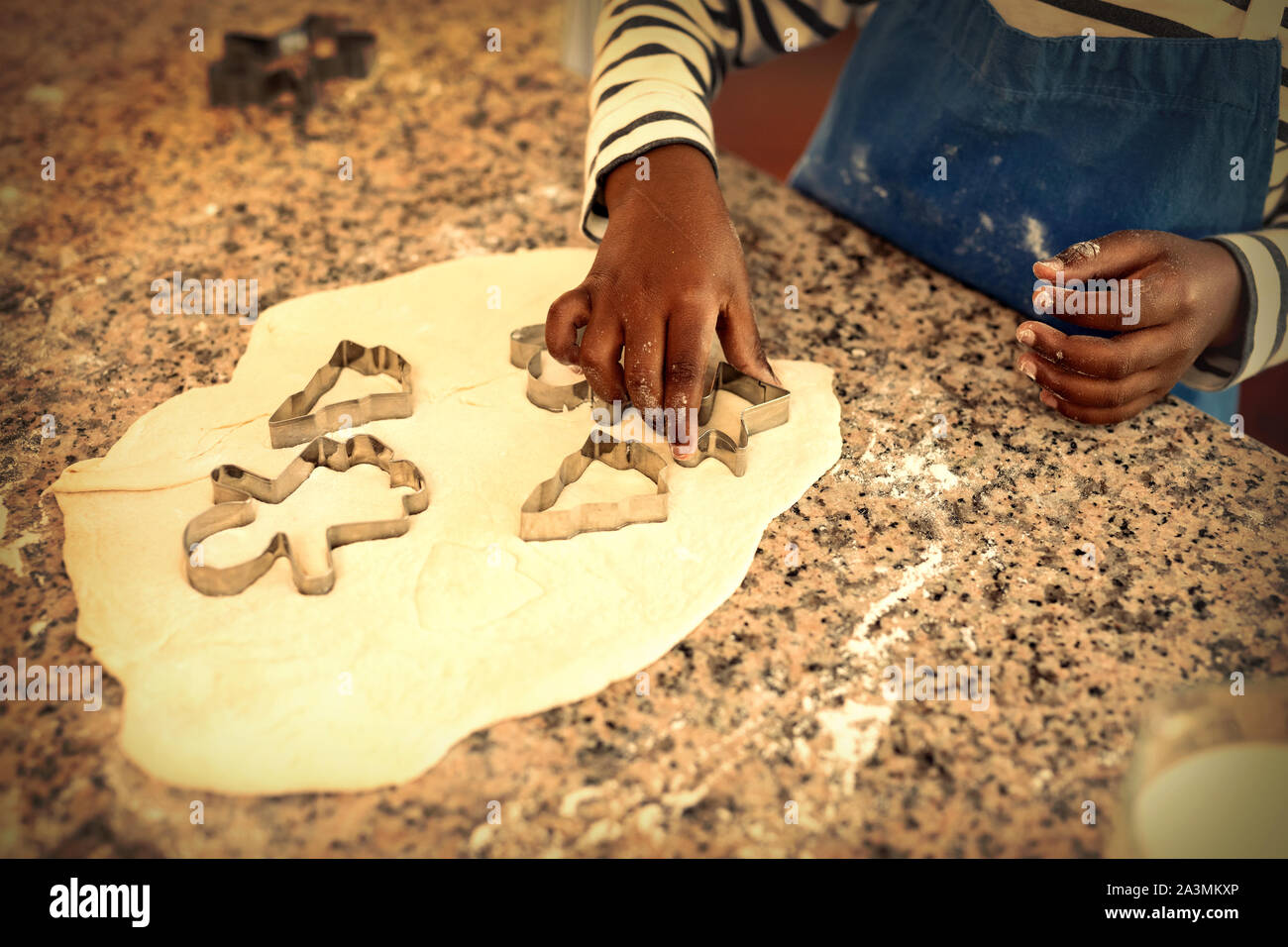 Boy making cookies hi-res stock photography and images - Alamy