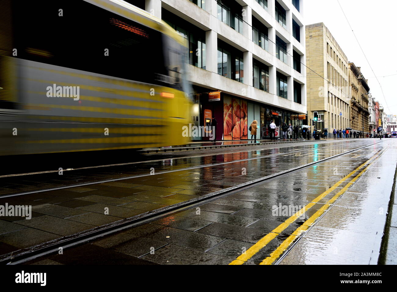 Tram in rain hi-res stock photography and images - Alamy