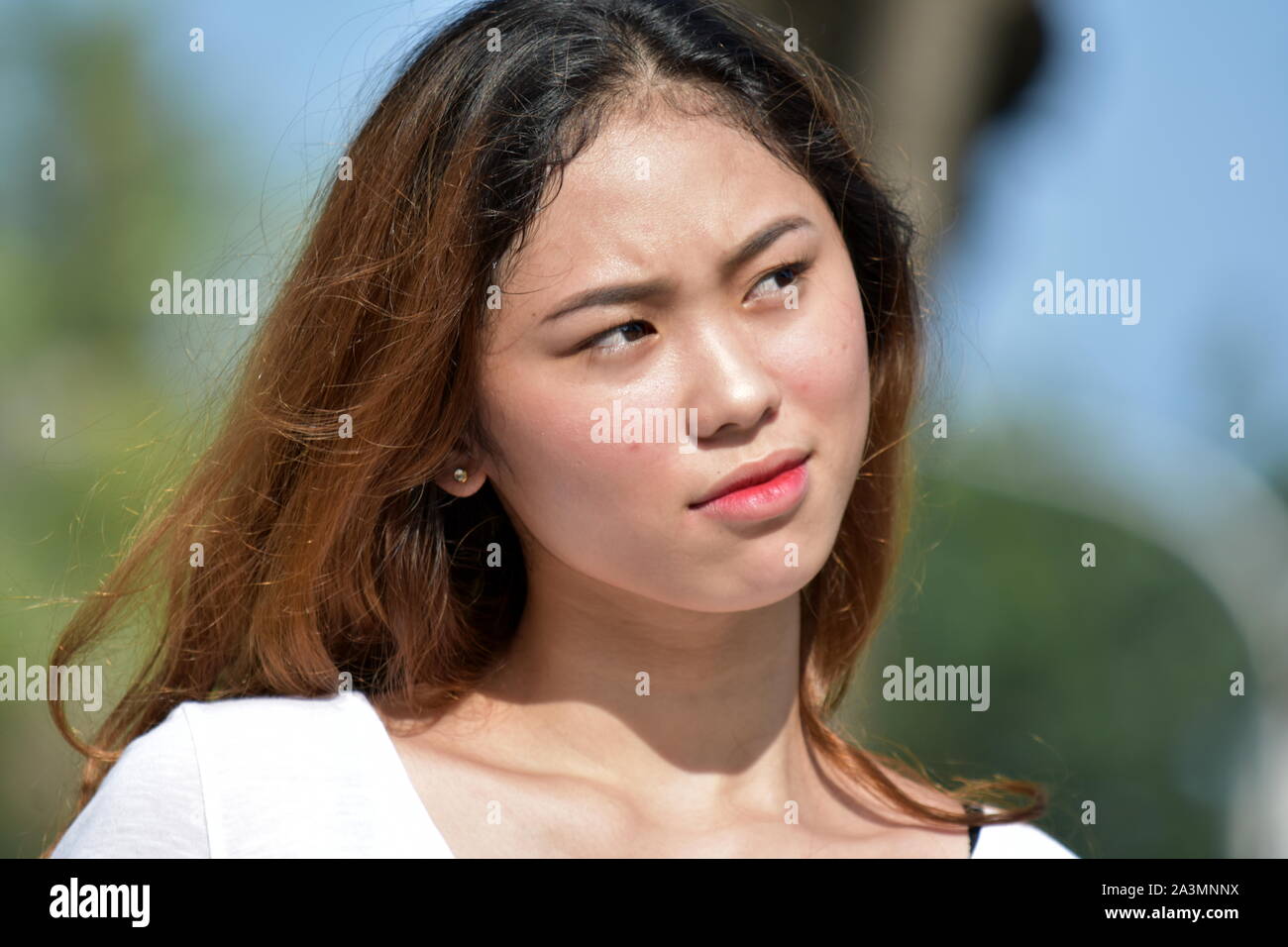 Beautiful Diverse Woman Wondering Stock Photo - Alamy