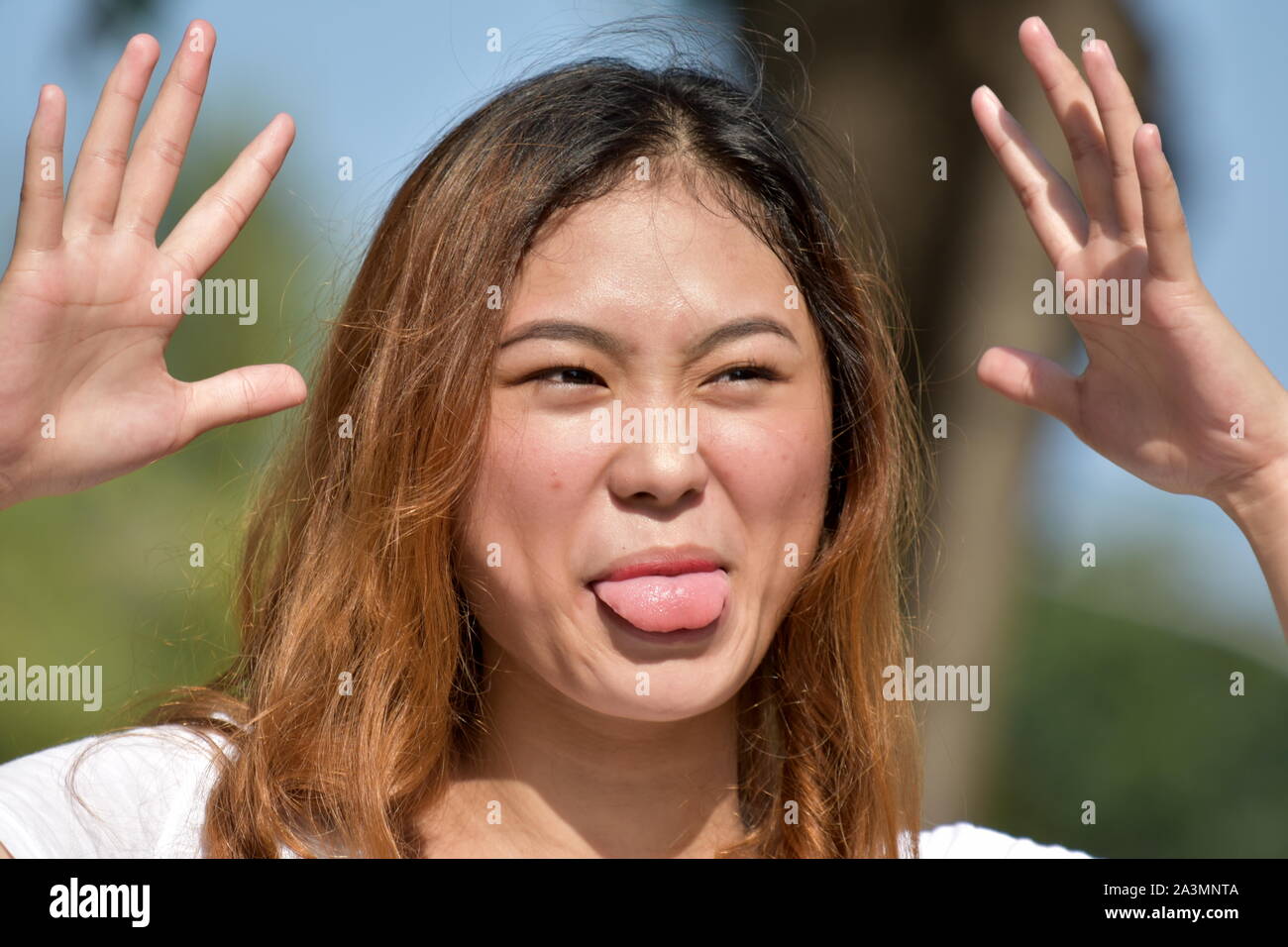 Young Filipina Female Making Funny Faces Stock Photo - Alamy