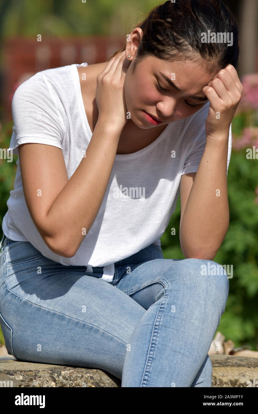An Aching Young Diverse Female Woman Stock Photo - Alamy