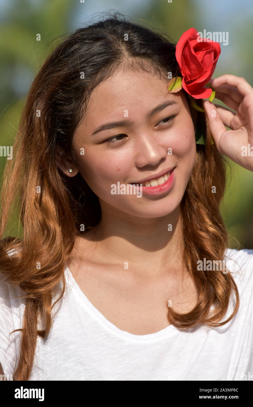 Youthful Filipina Female Smiling Stock Photo - Alamy