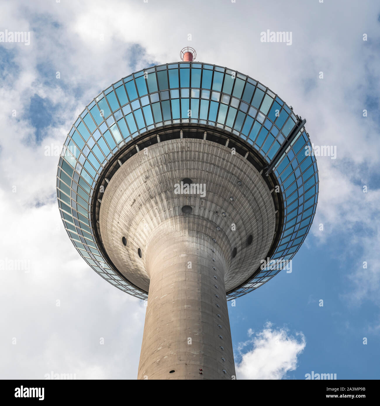 Looking up at the Rhein Tower (Rheinturm) TV tower on the banks of the ...