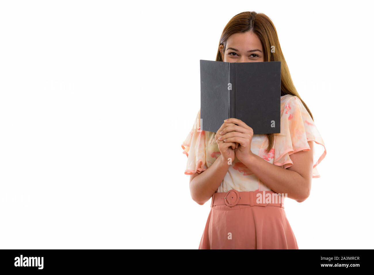 Beautiful young woman hiding behind hi-res stock photography and images ...