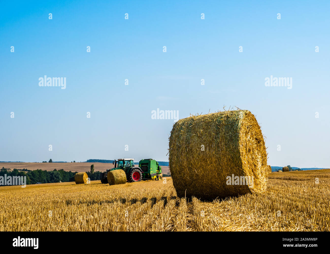Bale of straw tractor hi-res stock photography and images - Alamy