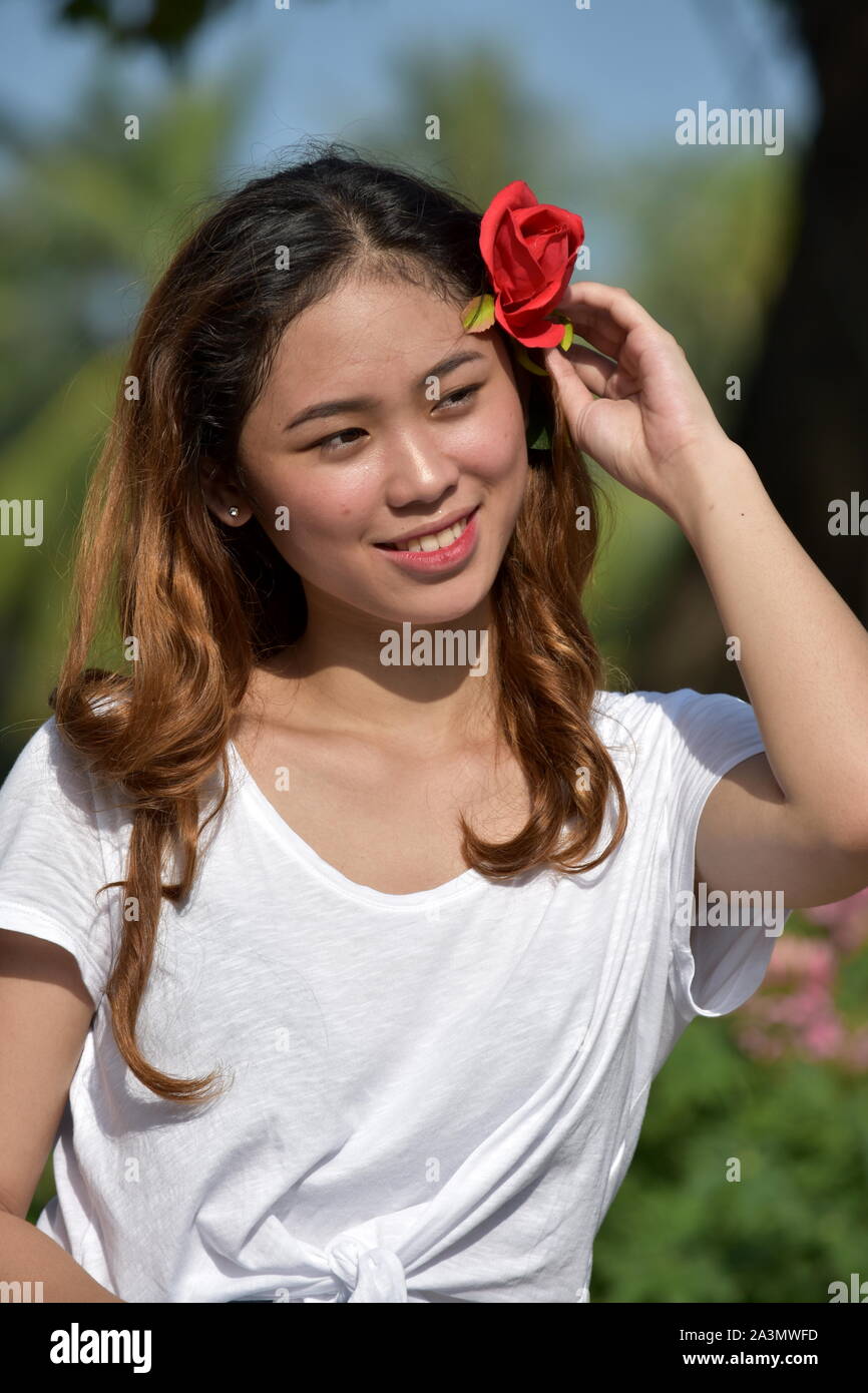 An Asian Female Smiling Stock Photo - Alamy