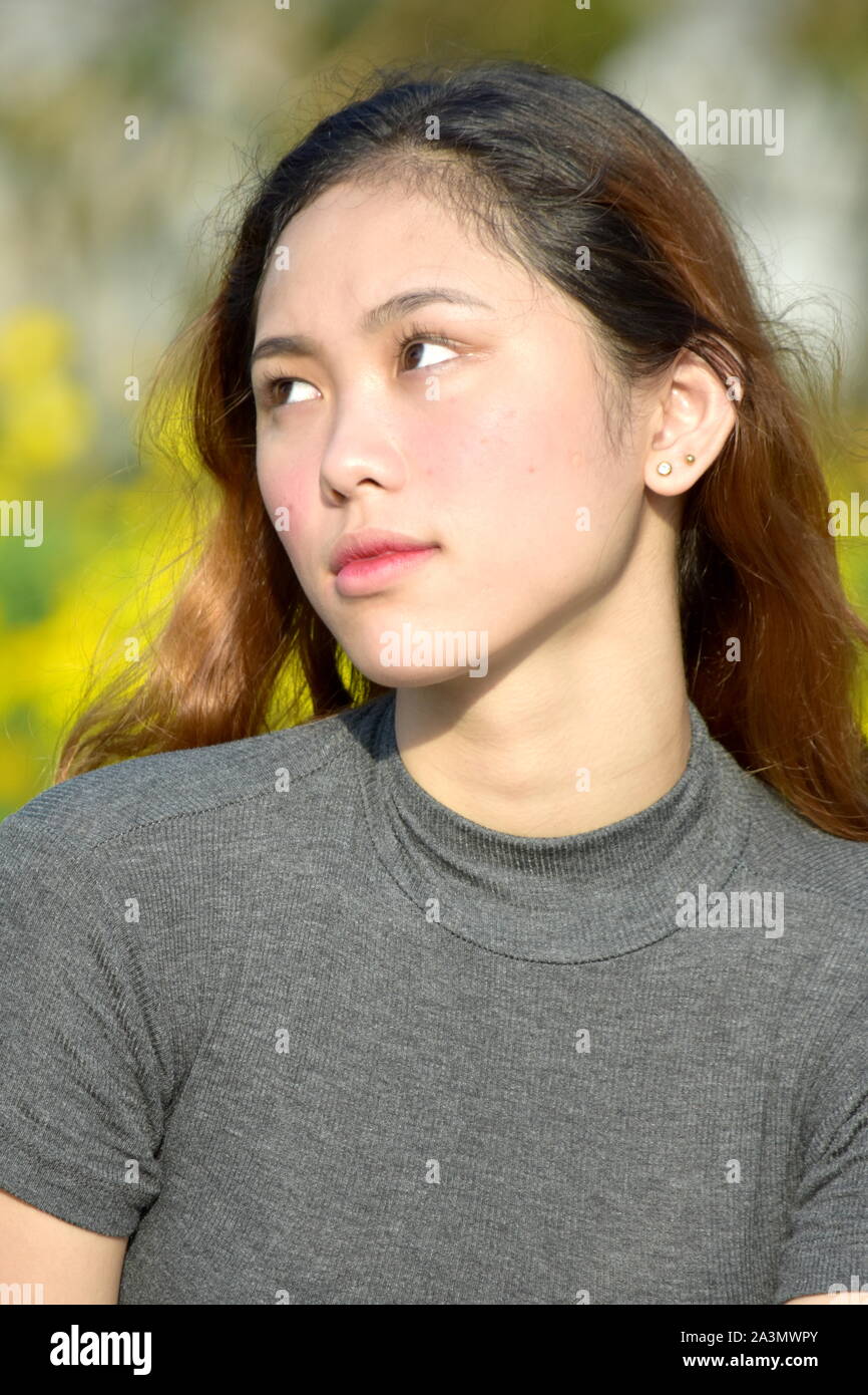 Bored Youthful Filipina Person Stock Photo - Alamy