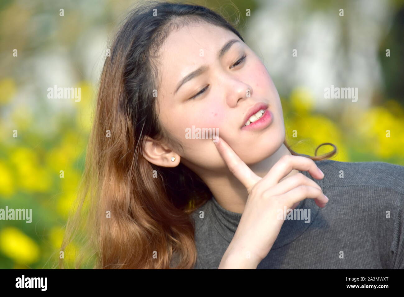 Female thinking hi-res stock photography and images - Alamy