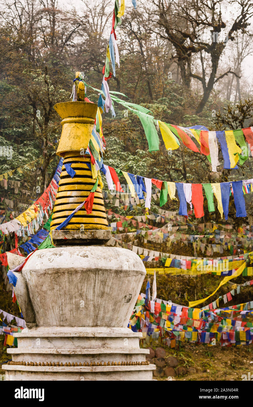 Small stupa decorated with prayer flags in Bhutan Stock Photo - Alamy