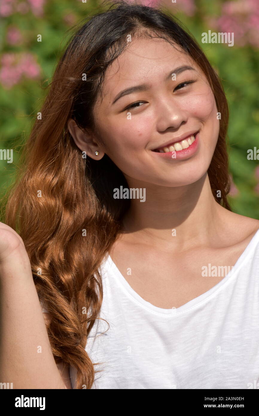 Smiling good looking female hi-res stock photography and images - Alamy