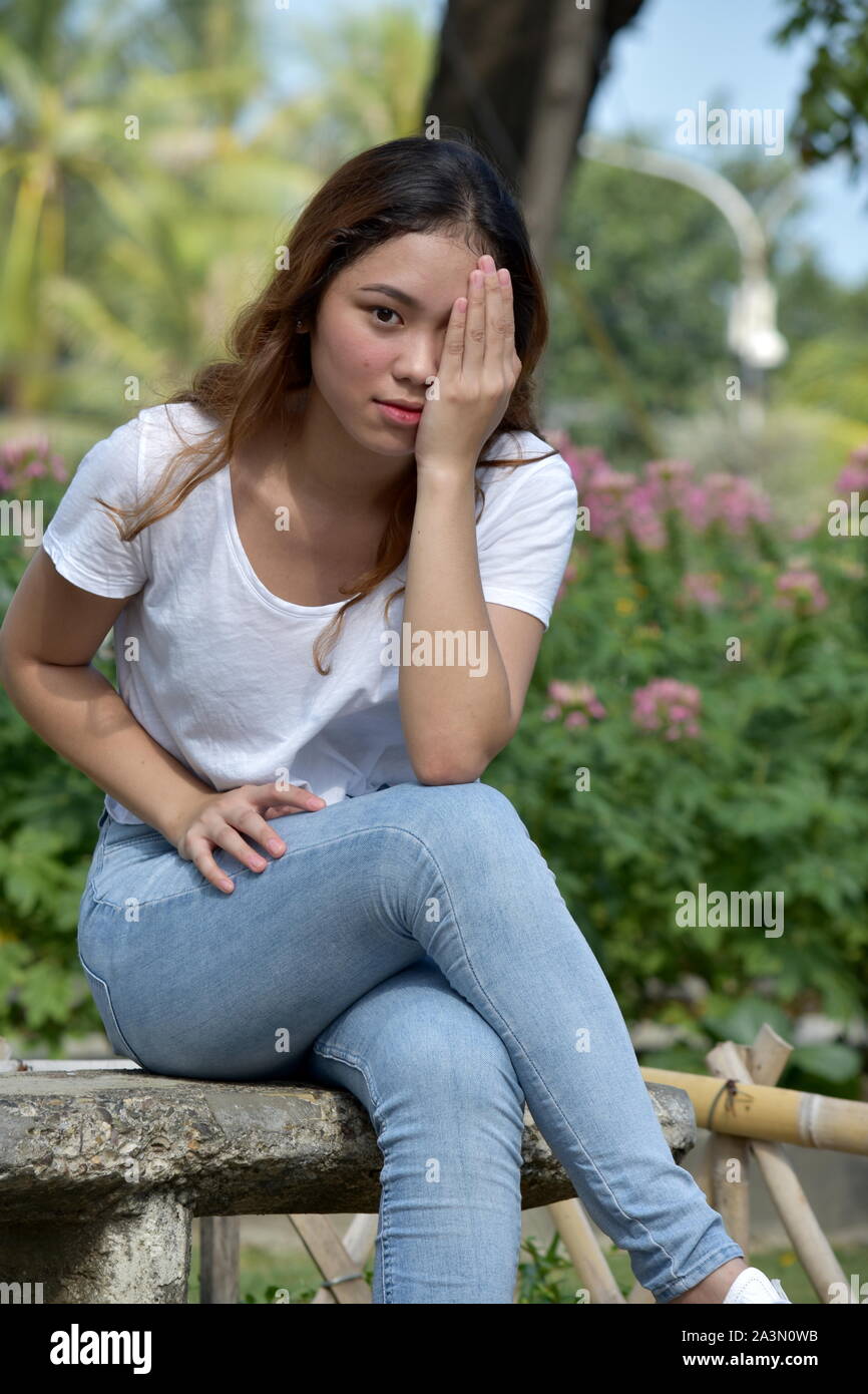 Shameful Pretty Minority Female Woman Stock Photo - Alamy