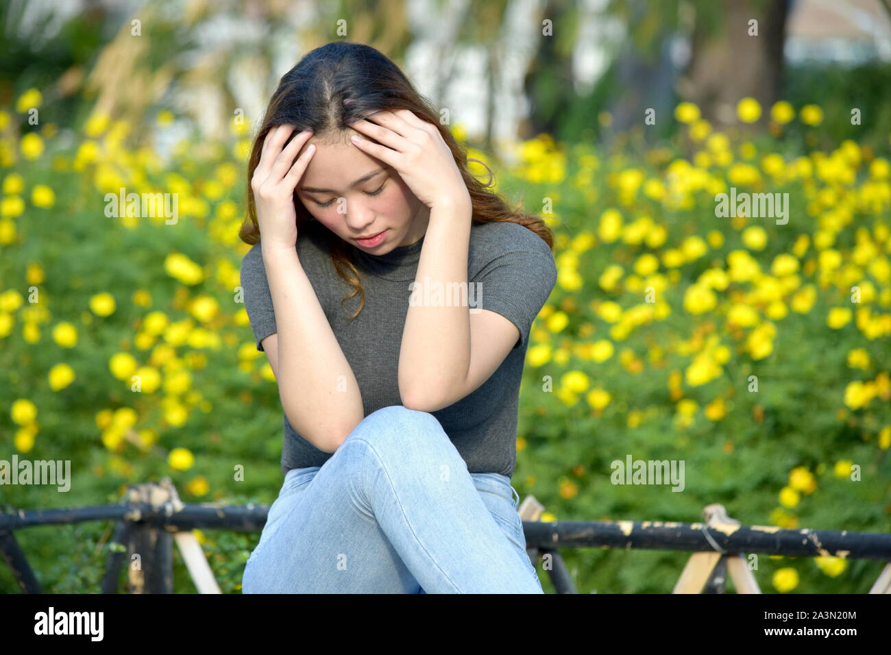 Stressed Young Asian Female Stock Photo - Alamy