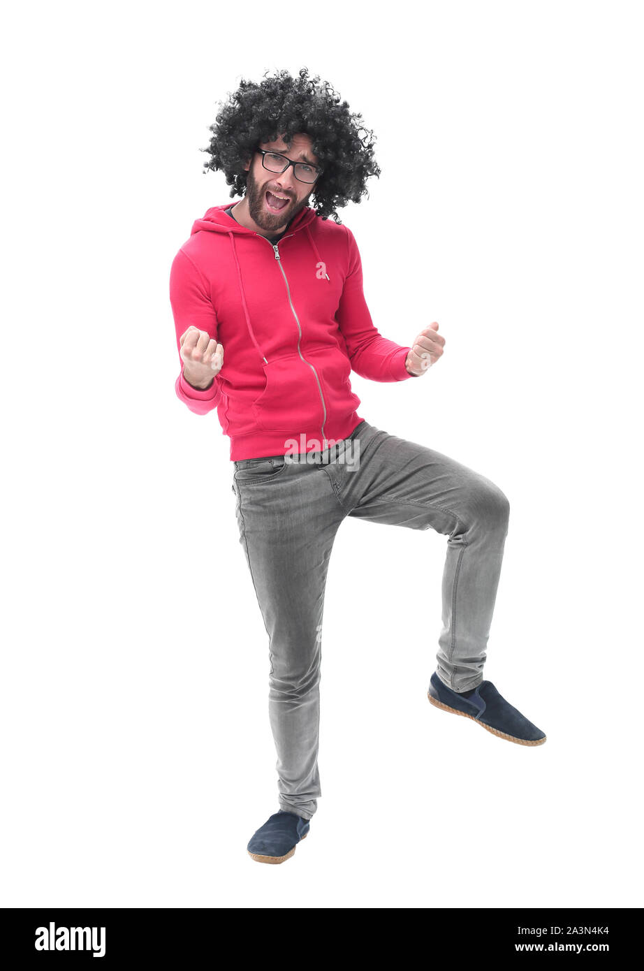 in full growth. portrait of cheerful curly-haired guy. isolated on ...