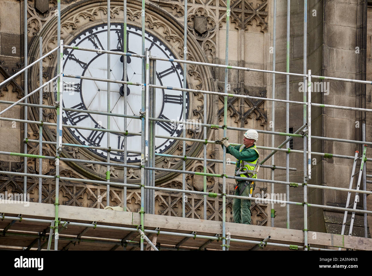 Scaffolding construction at the Clock tower of Manchester Cathedral ...