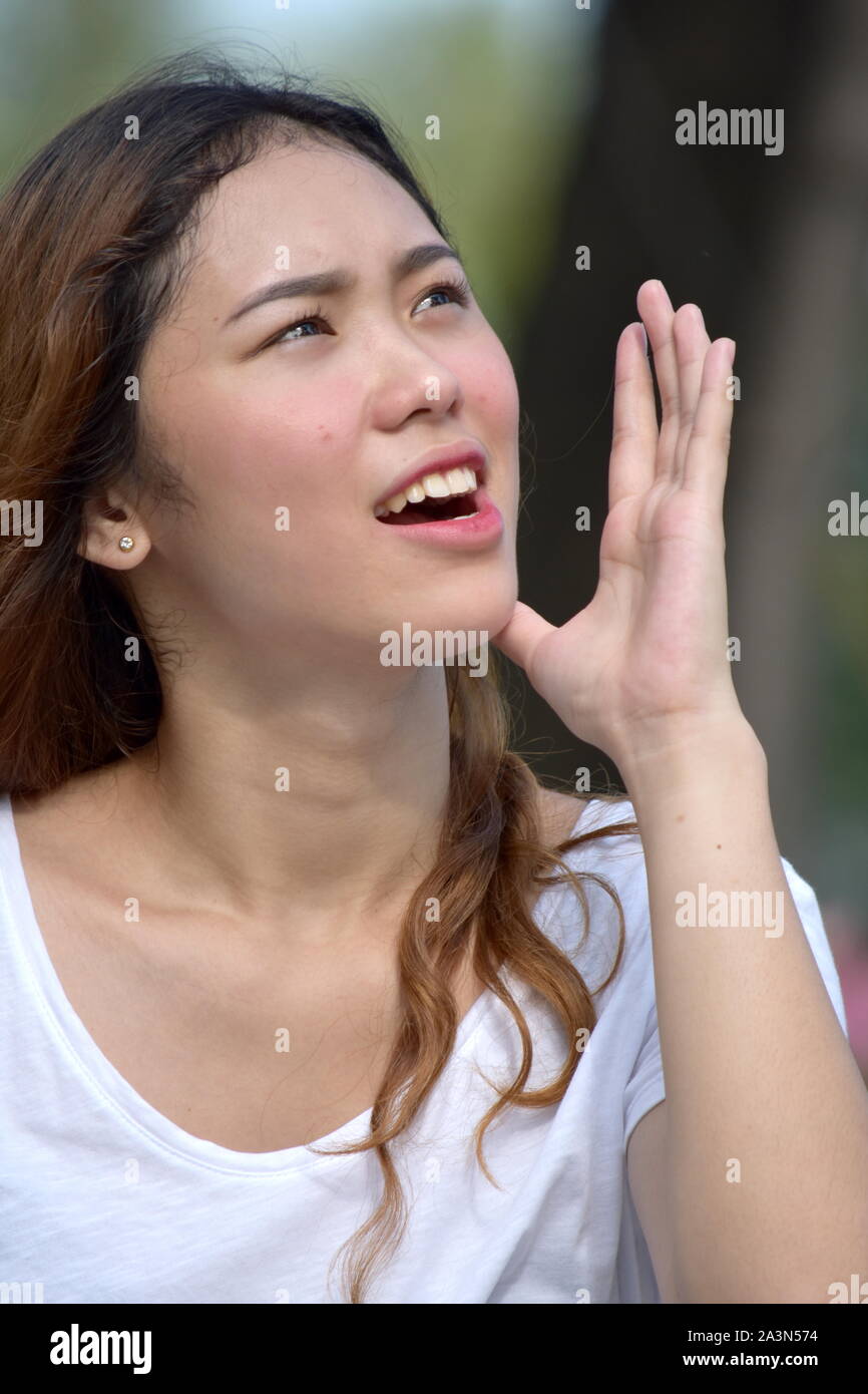 Talking Filipina Female Stock Photo - Alamy