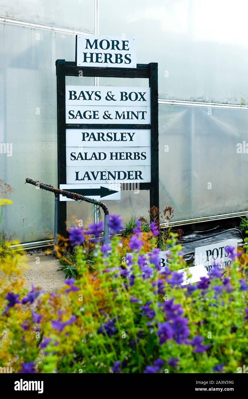 Information signs in a garden nursery centre Stock Photo - Alamy