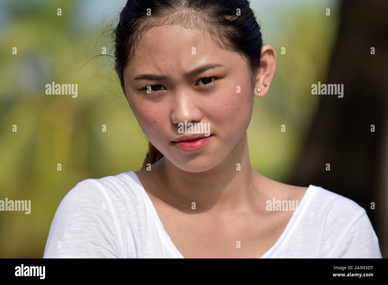 An Unemotional Adult Female Stock Photo - Alamy