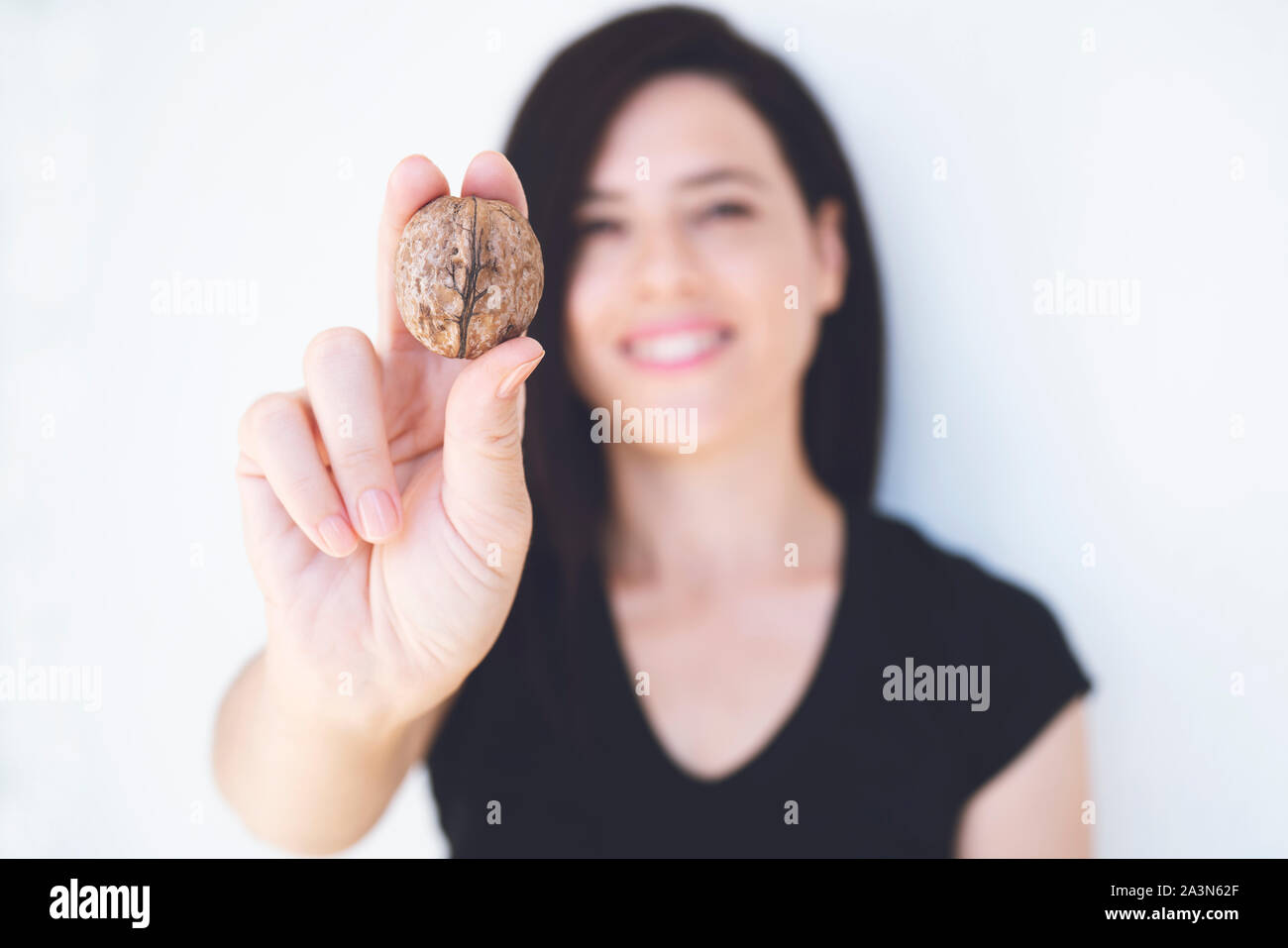 Walnuts woman hi-res stock photography and images - Alamy