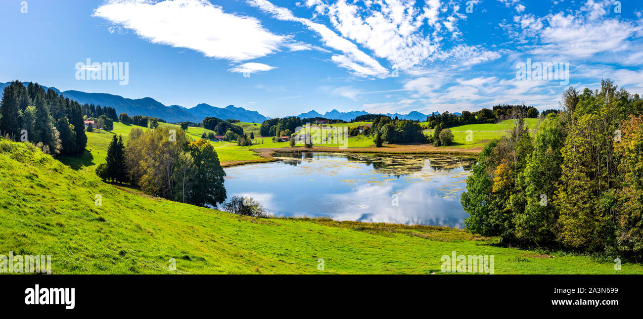 panoramic landscape with lake and mountains Stock Photo - Alamy