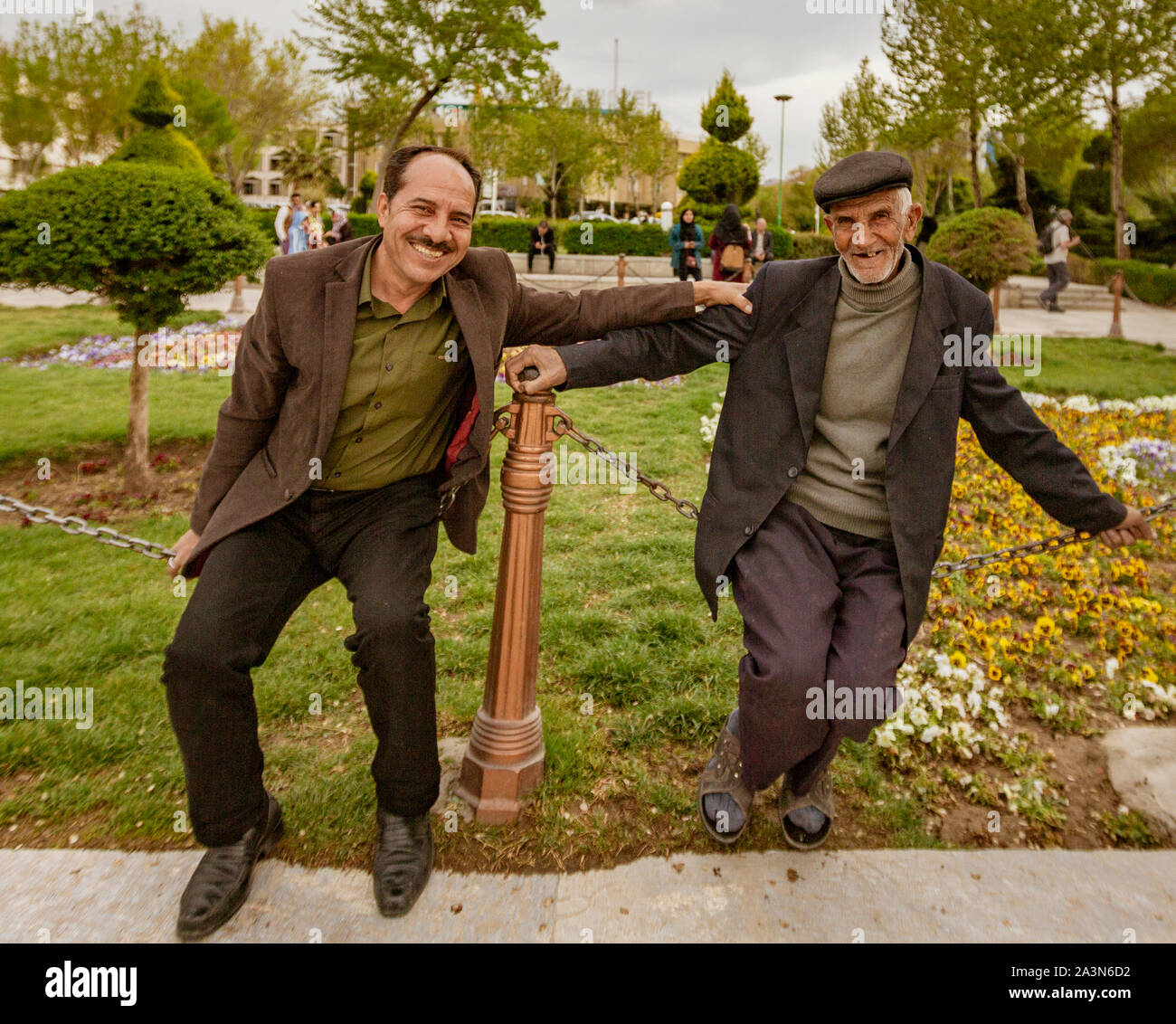 Men sitting on a fence hi-res stock photography and images - Alamy