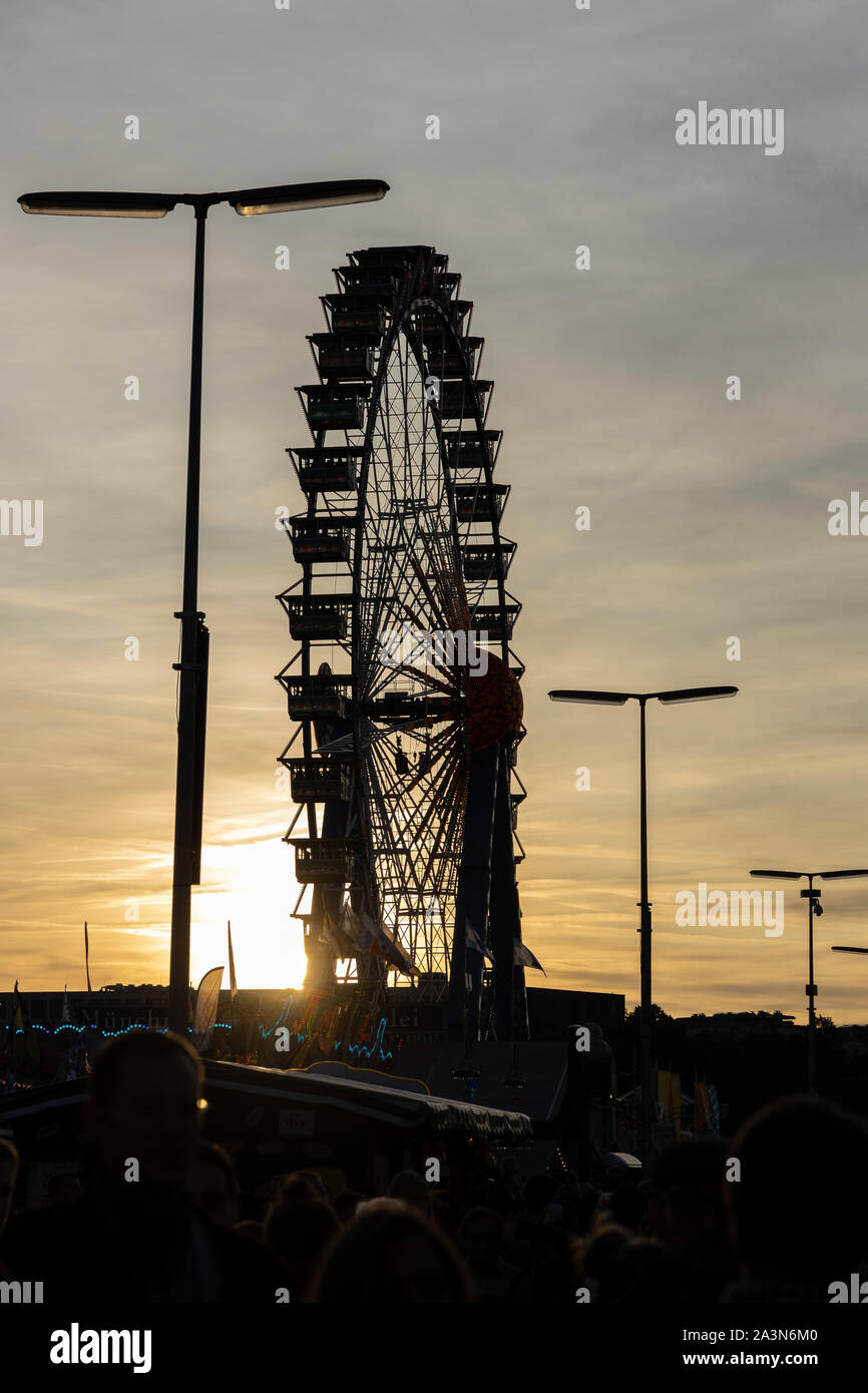 biggest portable ferris wheel of the world in the sunset at the ...