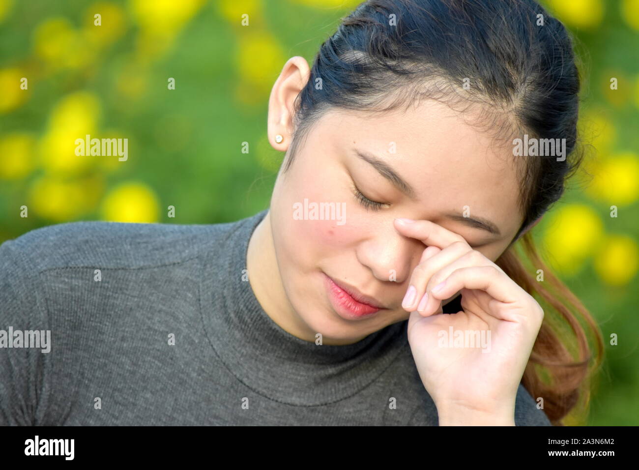 Tearful Asian Person Stock Photo - Alamy