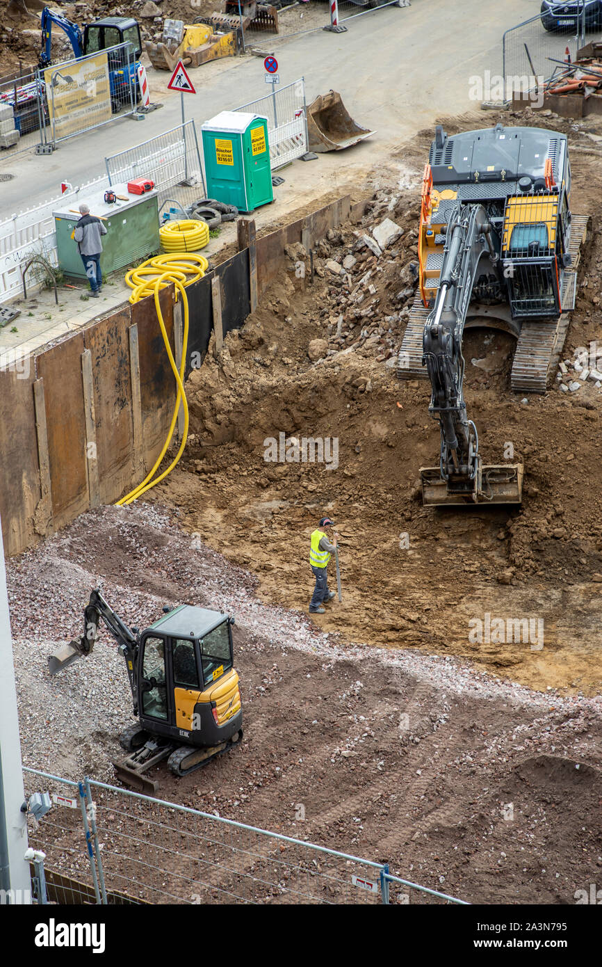 Construction work, dredging a construction pit for a residential ...