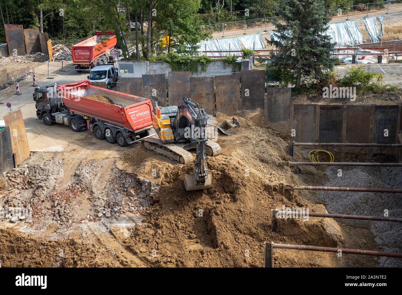 Construction work, dredging a construction pit for a residential ...