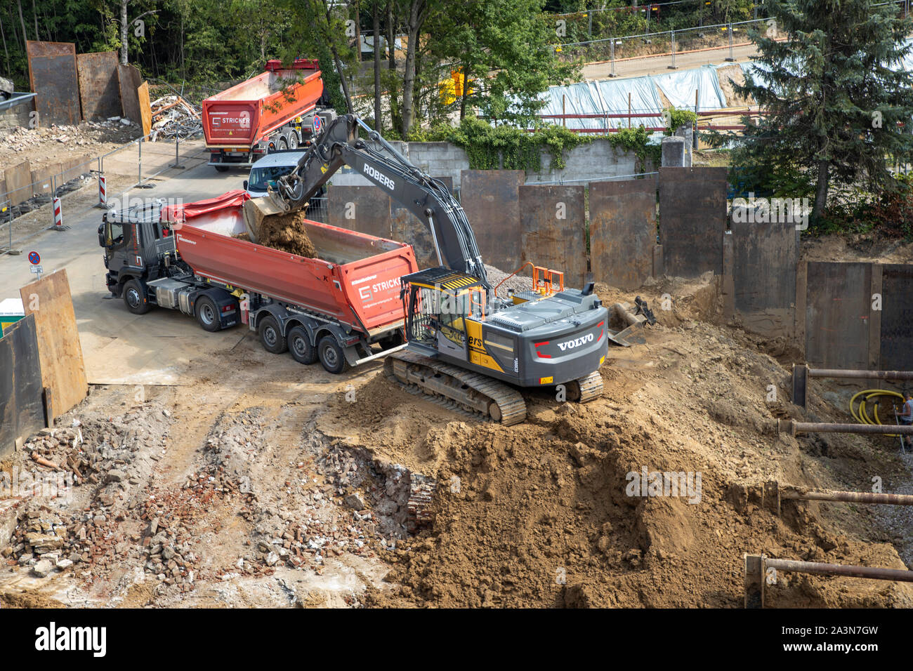 Construction work, dredging a construction pit for a residential ...