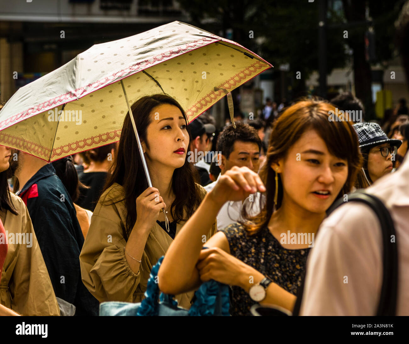 Pedestrian scene with umbrella and Street Life in Tokyo, Japan Stock ...