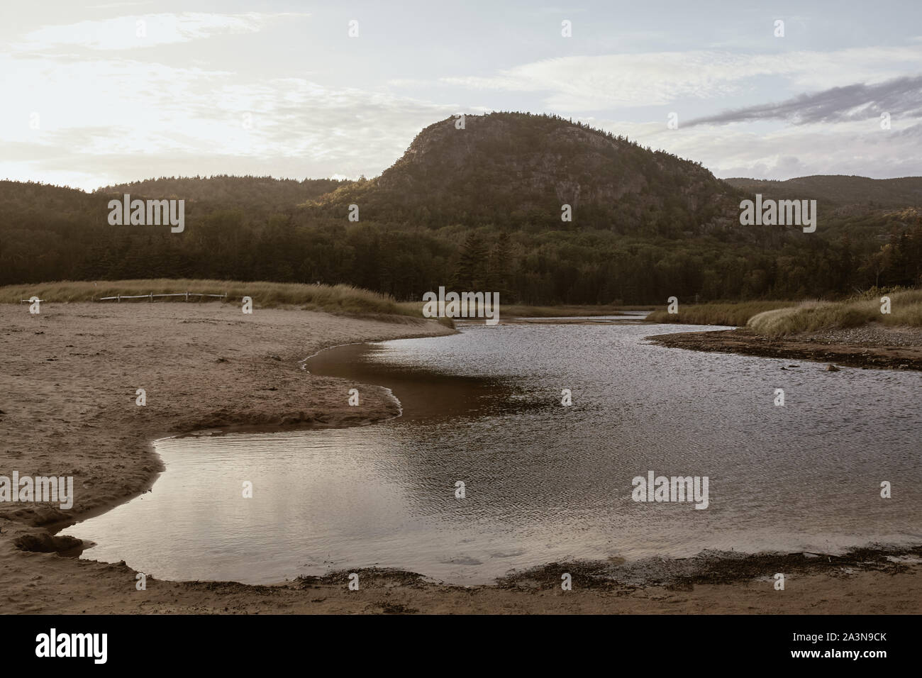 Beehive Mountain at sunset against Beehive Lagoon near Sand Beach at ...
