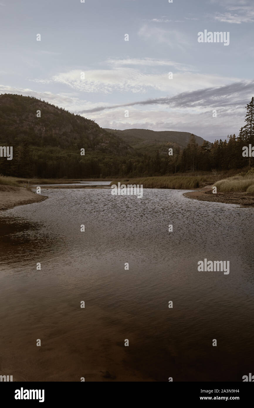 Beehive Mountain at sunset against Beehive Lagoon near Sand Beach at ...