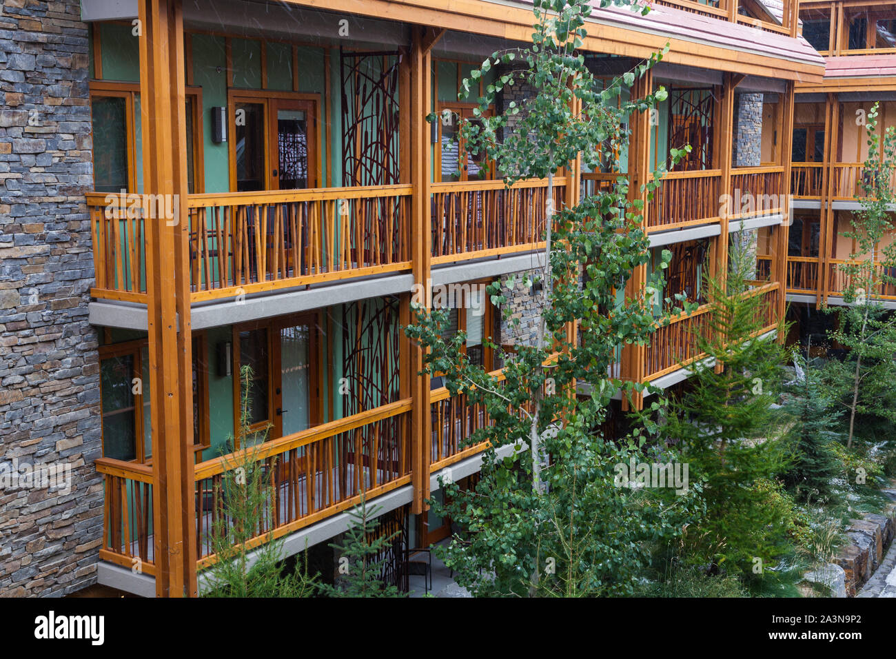 Typical architecture of newer hotels in the mountain town of Banff ...