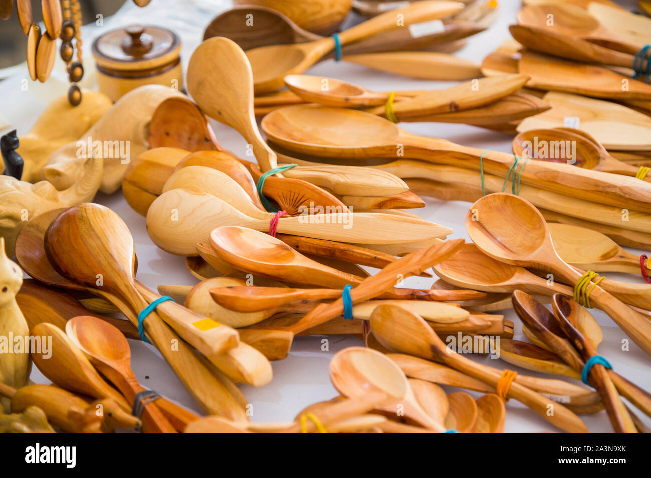 Wooden spoons at the fair Stock Photo - Alamy