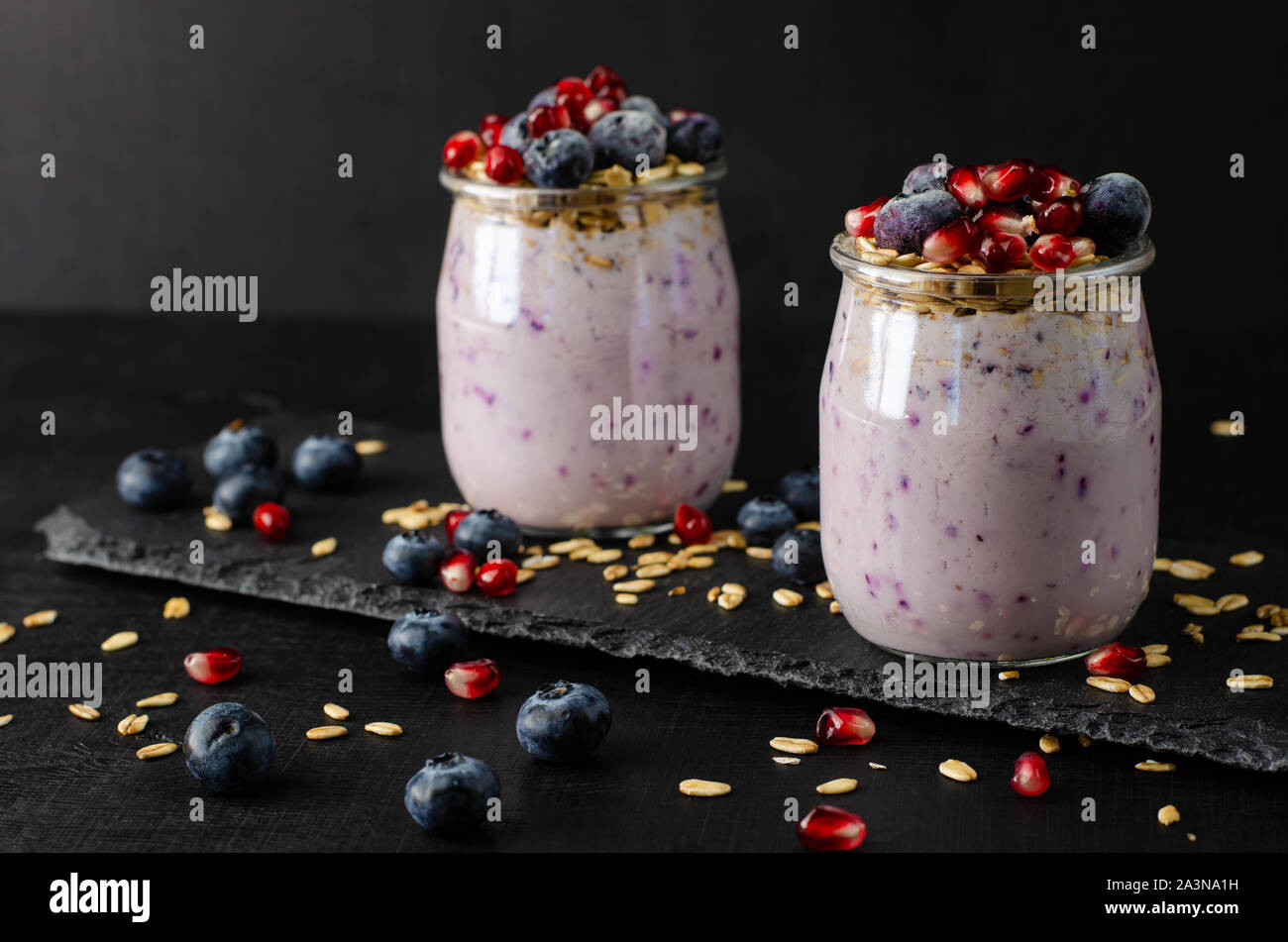 Healthy fitness food concept. Jars of yogurt with blueberries ...